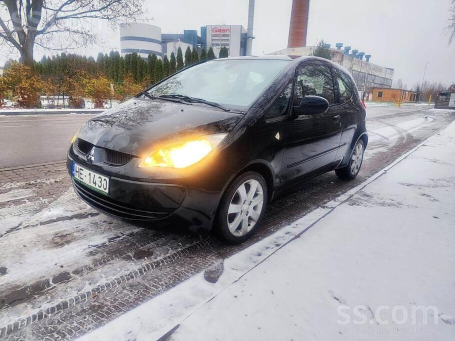 Black Mitsubishi Colt 2006 in Jelgava, with an engine capacity of 1.30 L and mileage of 155 thousand km for 1099 €, photo 5 on AUTOMOTO.COM.LV