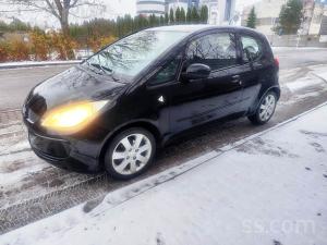 Black Mitsubishi Colt 2006 in Jelgava, with an engine capacity of 1.30 L and mileage of 155 thousand km for 1099 €, photo 7 on AUTOMOTO.COM.LV