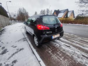 Black Mitsubishi Colt 2006 in Jelgava, with an engine capacity of 1.30 L and mileage of 155 thousand km for 1099 €, photo 8 on AUTOMOTO.COM.LV
