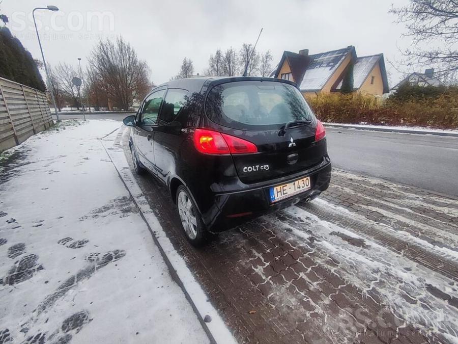 Black Mitsubishi Colt 2006 in Jelgava, with an engine capacity of 1.30 L and mileage of 155 thousand km for 1099 €, photo 8 on AUTOMOTO.COM.LV
