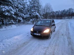 Black Mitsubishi Colt 2006 in Vilnius, with an engine capacity of 1.12 L and mileage of 149 thousand km for 1150 €, photo 2 on AUTOMOTO.COM.LV