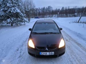 Black Mitsubishi Colt 2006 in Vilnius, with an engine capacity of 1.12 L and mileage of 149 thousand km for 1150 €, photo 3 on AUTOMOTO.COM.LV