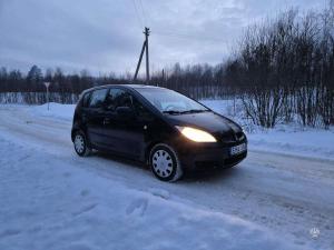 Black Mitsubishi Colt 2006 in Vilnius, with an engine capacity of 1.12 L and mileage of 149 thousand km for 1150 €, photo 6 on AUTOMOTO.COM.LV