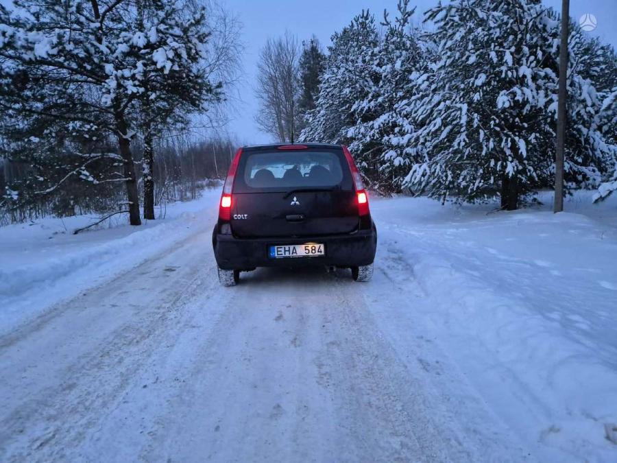 Black Mitsubishi Colt 2006 in Vilnius, with an engine capacity of 1.12 L and mileage of 149 thousand km for 1150 €, photo 8 on AUTOMOTO.COM.LV