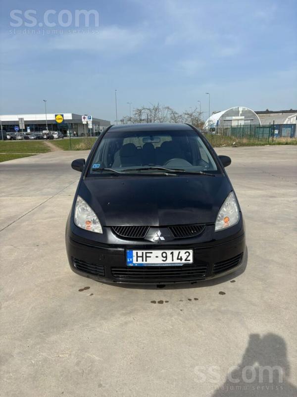 Melns Mitsubishi Colt 2006 Liepāja, ar dzinēja tilpumu 1.30 L un nobraukumu 257 tūkst. km par 850 €, foto 2 vietnē AUTOMOTO.COM.LV