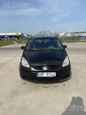 Melns Mitsubishi Colt 2006 Liepāja, ar dzinēja tilpumu 1.30 L un nobraukumu 257 tūkst. km par 850 €, foto 3 vietnē AUTOMOTO.COM.LV