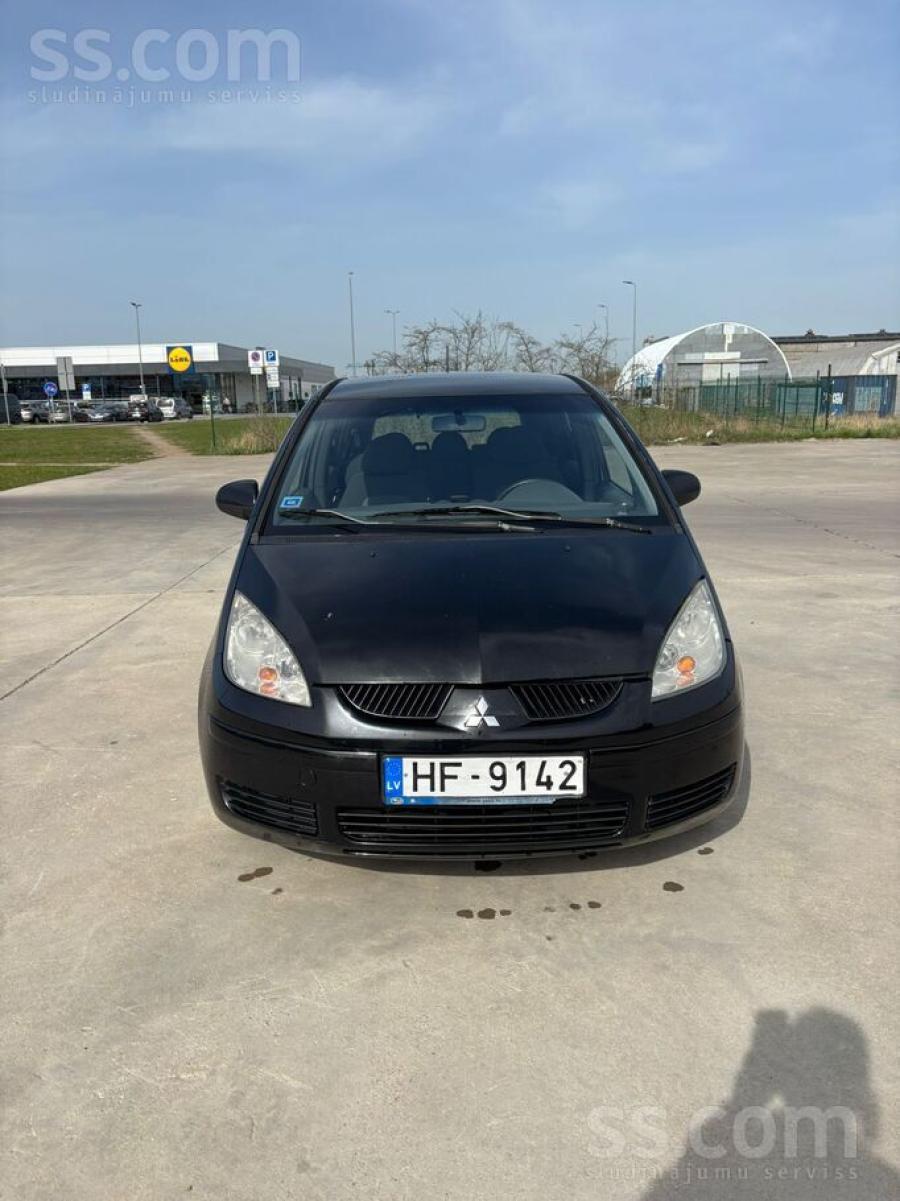 Melns Mitsubishi Colt 2006 Liepāja, ar dzinēja tilpumu 1.30 L un nobraukumu 257 tūkst. km par 850 €, foto 3 vietnē AUTOMOTO.COM.LV