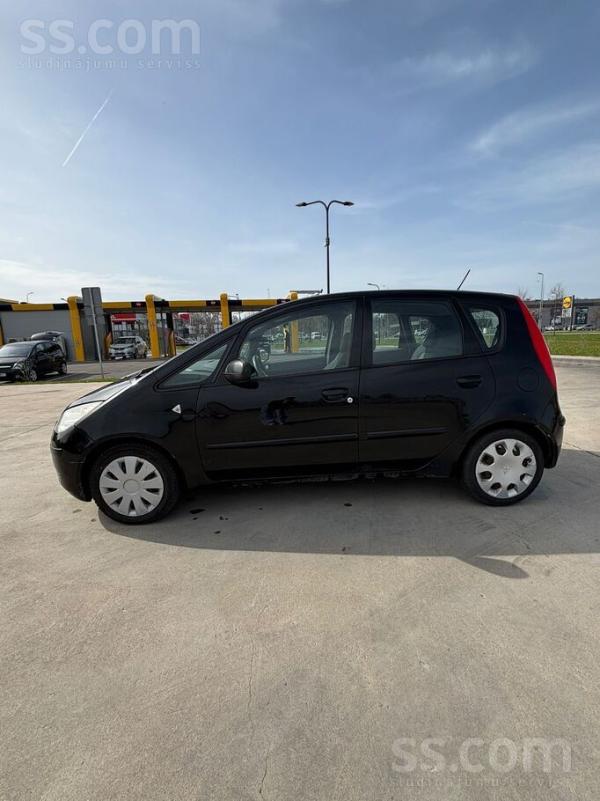 Melns Mitsubishi Colt 2006 Liepāja, ar dzinēja tilpumu 1.30 L un nobraukumu 257 tūkst. km par 850 €, foto 3 vietnē AUTOMOTO.COM.LV