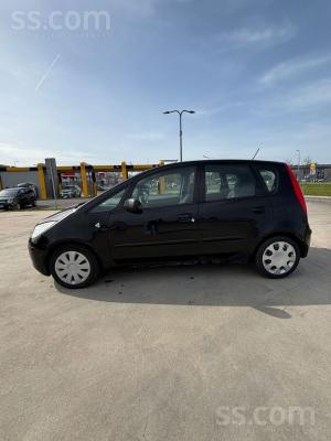 Melns Mitsubishi Colt 2006 Liepāja, ar dzinēja tilpumu 1.30 L un nobraukumu 257 tūkst. km par 850 €, foto 4 vietnē AUTOMOTO.COM.LV
