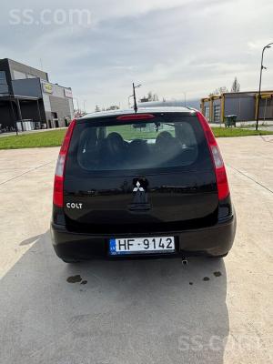 Melns Mitsubishi Colt 2006 Liepāja, ar dzinēja tilpumu 1.30 L un nobraukumu 257 tūkst. km par 850 €, foto 6 vietnē AUTOMOTO.COM.LV