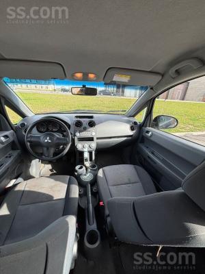 Melns Mitsubishi Colt 2006 Liepāja, ar dzinēja tilpumu 1.30 L un nobraukumu 257 tūkst. km par 850 €, foto 12 vietnē AUTOMOTO.COM.LV