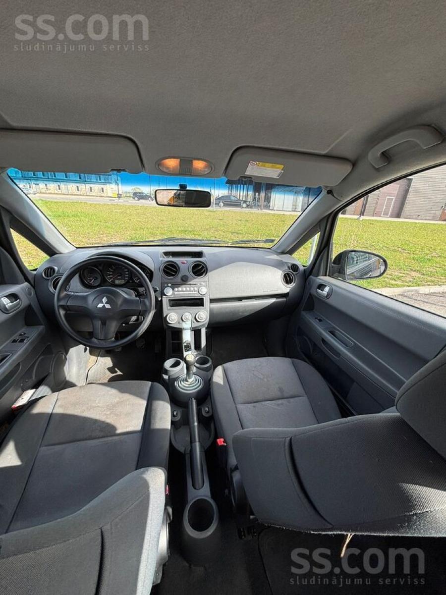 Melns Mitsubishi Colt 2006 Liepāja, ar dzinēja tilpumu 1.30 L un nobraukumu 257 tūkst. km par 850 €, foto 12 vietnē AUTOMOTO.COM.LV