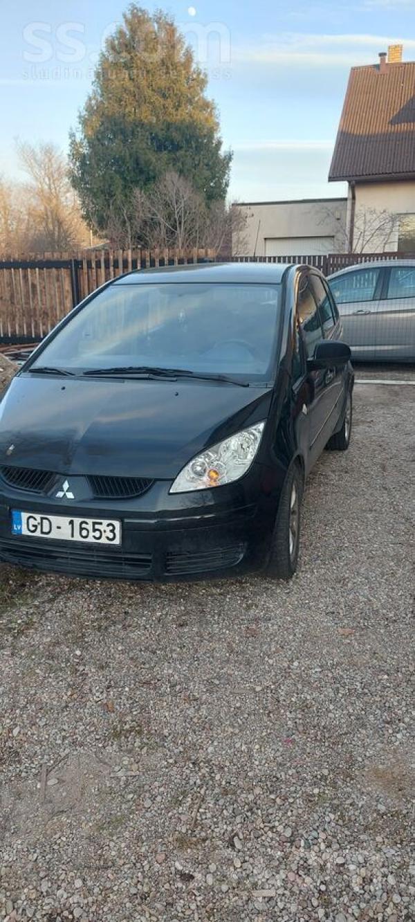 Melns Mitsubishi Colt 2006 Ventspils, ar dzinēja tilpumu 1.30 L un nobraukumu 267 tūkst. km par 1100 €, foto 1 vietnē AUTOMOTO.COM.LV