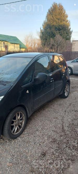 Melns Mitsubishi Colt 2006 Ventspils, ar dzinēja tilpumu 1.30 L un nobraukumu 267 tūkst. km par 1100 €, foto 3 vietnē AUTOMOTO.COM.LV