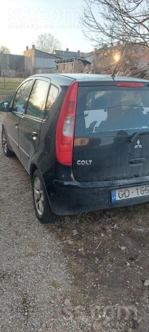 Melns Mitsubishi Colt 2006 Ventspils, ar dzinēja tilpumu 1.30 L un nobraukumu 267 tūkst. km par 1100 €, foto 4 vietnē AUTOMOTO.COM.LV