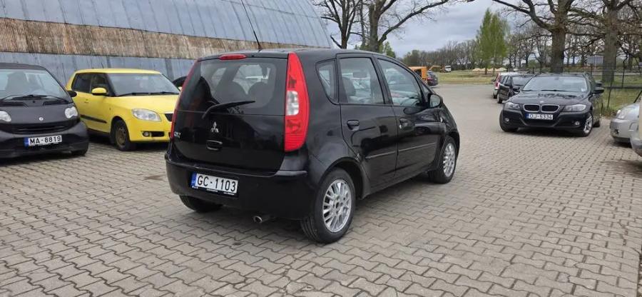 Melns Mitsubishi Colt 2006 Valmiera, ar dzinēja tilpumu 1.30 L un nobraukumu 196 tūkst. km par 1000 €, foto 4 vietnē AUTOMOTO.COM.LV