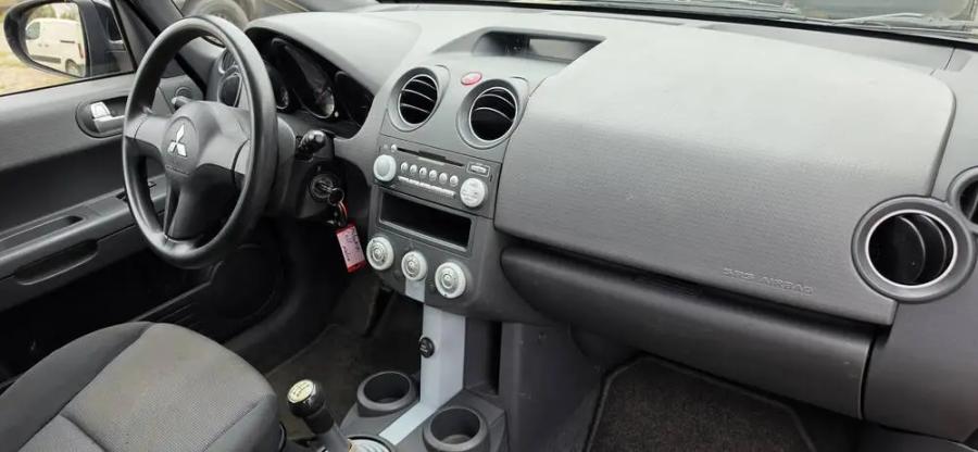 Melns Mitsubishi Colt 2006 Valmiera, ar dzinēja tilpumu 1.30 L un nobraukumu 196 tūkst. km par 1000 €, foto 10 vietnē AUTOMOTO.COM.LV