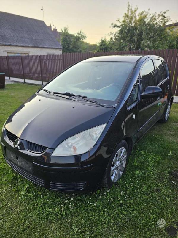 Melns Mitsubishi Colt 2006 Kretinga, ar dzinēja tilpumu 1.49 L un nobraukumu 221 tūkst. km par 800 €, foto 4 vietnē AUTOMOTO.COM.LV