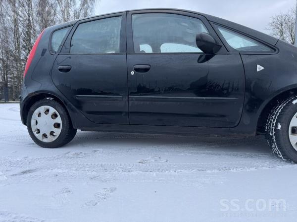 Melns Mitsubishi Colt 2007 Rīga, ar dzinēja tilpumu 1.30 L un nobraukumu 238 tūkst. km par 850 €, foto 10 vietnē AUTOMOTO.COM.LV