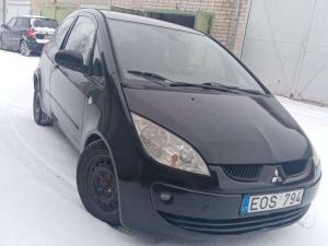 Melns Mitsubishi Colt 2007 Elektrėnai, ar dzinēja tilpumu 1.49 L un nobraukumu 270 tūkst. km par 550 €, foto  vietnē AUTOMOTO.COM.LV