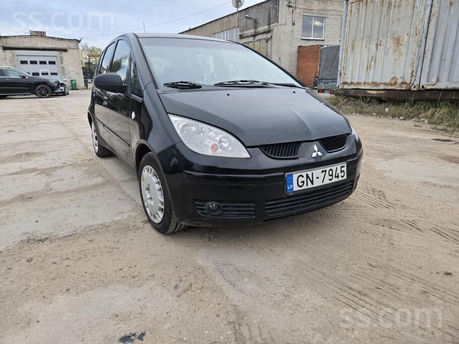 Black Mitsubishi Colt 2007 in Riga, with an engine capacity of 1.30 L and mileage of 326 thousand km for 700 €, photo 1 on AUTOMOTO.COM.LV