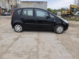 Black Mitsubishi Colt 2007 in Riga, with an engine capacity of 1.30 L and mileage of 326 thousand km for 700 €, photo 3 on AUTOMOTO.COM.LV