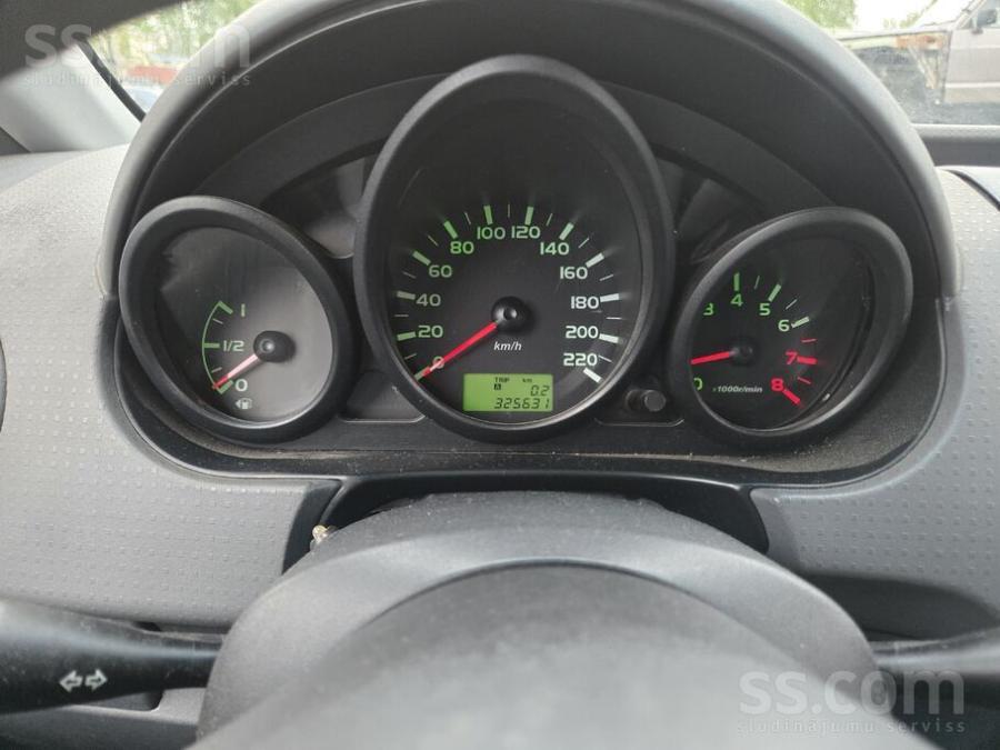 Black Mitsubishi Colt 2007 in Riga, with an engine capacity of 1.30 L and mileage of 326 thousand km for 700 €, photo 5 on AUTOMOTO.COM.LV