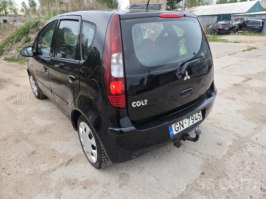 Black Mitsubishi Colt 2007 in Riga, with an engine capacity of 1.30 L and mileage of 326 thousand km for 700 €, photo 8 on AUTOMOTO.COM.LV