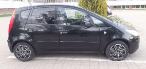 Black Mitsubishi Colt 2007 in Riga, with an engine capacity of 1.30 L and mileage of 191 thousand km for 1590 €, photo  on AUTOMOTO.COM.LV