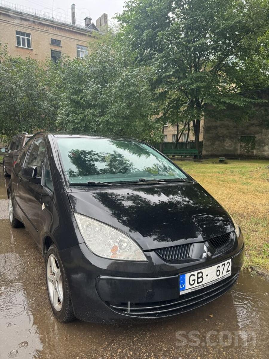 Black Mitsubishi Colt 2007 in Riga, with an engine capacity of 1.30 L and mileage of 189 thousand km for 850 €, photo 1 on AUTOMOTO.COM.LV