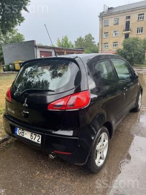 Black Mitsubishi Colt 2007 in Riga, with an engine capacity of 1.30 L and mileage of 189 thousand km for 850 €, photo 3 on AUTOMOTO.COM.LV