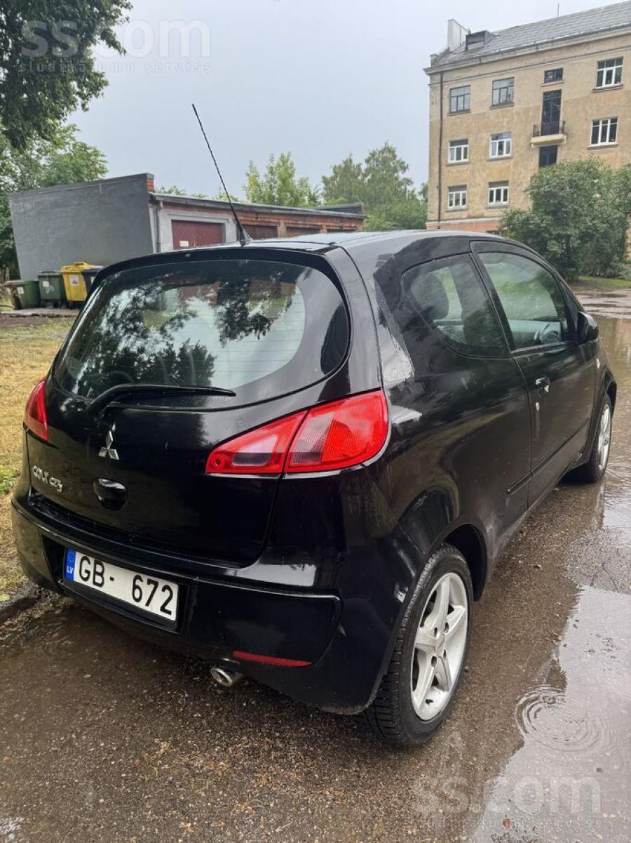 Black Mitsubishi Colt 2007 in Riga, with an engine capacity of 1.30 L and mileage of 189 thousand km for 850 €, photo 3 on AUTOMOTO.COM.LV