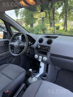 Melns Mitsubishi Colt 2007 Jelgava, ar dzinēja tilpumu 1.10 L un nobraukumu 153 tūkst. km par 800 €, foto 10 vietnē AUTOMOTO.COM.LV