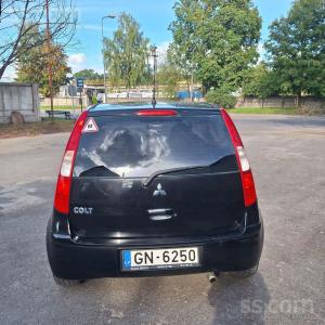 Black Mitsubishi Colt 2007 in Riga, with an engine capacity of 1.30 L and mileage of 161 thousand km for 1200 €, photo 6 on AUTOMOTO.COM.LV