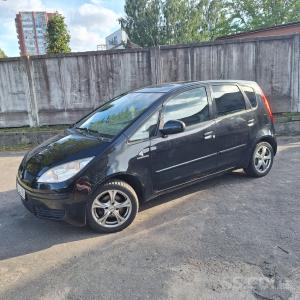 Black Mitsubishi Colt 2007 in Riga, with an engine capacity of 1.30 L and mileage of 161 thousand km for 1200 €, photo 7 on AUTOMOTO.COM.LV