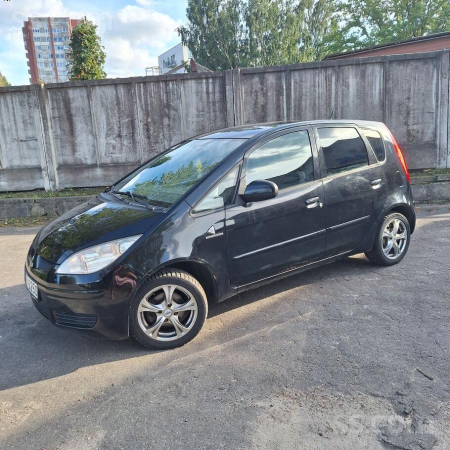 Black Mitsubishi Colt 2007 in Riga, with an engine capacity of 1.30 L and mileage of 161 thousand km for 1200 €, photo 7 on AUTOMOTO.COM.LV