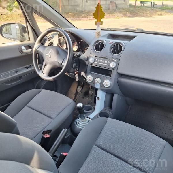 Melns Mitsubishi Colt 2007 Rīga, ar dzinēja tilpumu 1.30 L un nobraukumu 161 tūkst. km par 1200 €, foto 11 vietnē AUTOMOTO.COM.LV