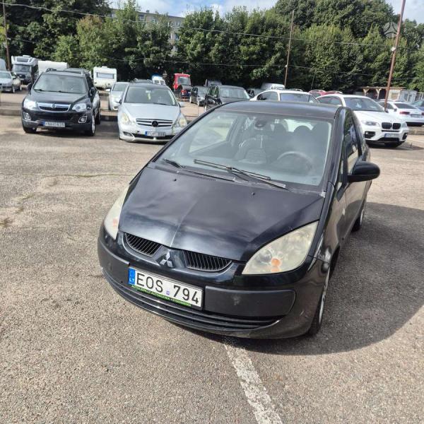 Black Mitsubishi Colt 2007 in Klaipeda, with an engine capacity of 1.49 L and mileage of 280 thousand km for 500 €, photo 4 on AUTOMOTO.COM.LV