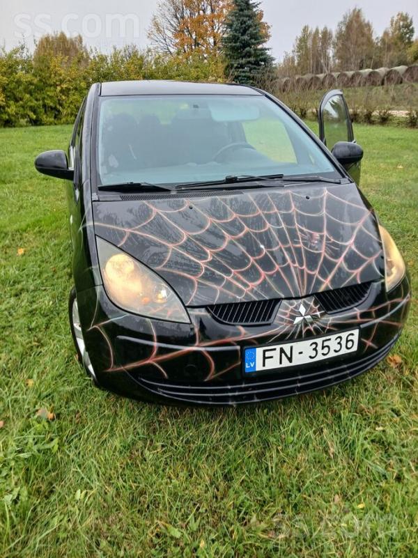 Black Mitsubishi Colt 2007 in Riga, with an engine capacity of 1.30 L and mileage of 227 thousand km for 1100 €, photo 1 on AUTOMOTO.COM.LV