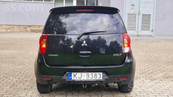Black Mitsubishi Colt 2008 in Riga, with an engine capacity of 1.30 L and mileage of 0 thousand km for 1750 €, photo 6 on AUTOMOTO.COM.LV