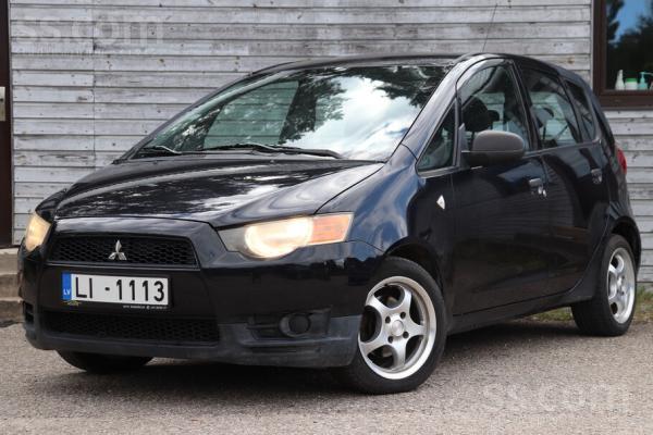 Black Mitsubishi Colt 2009 in Valmiera, with an engine capacity of 1.30 L and mileage of 179 thousand km for 2500 €, photo 1 on AUTOMOTO.COM.LV