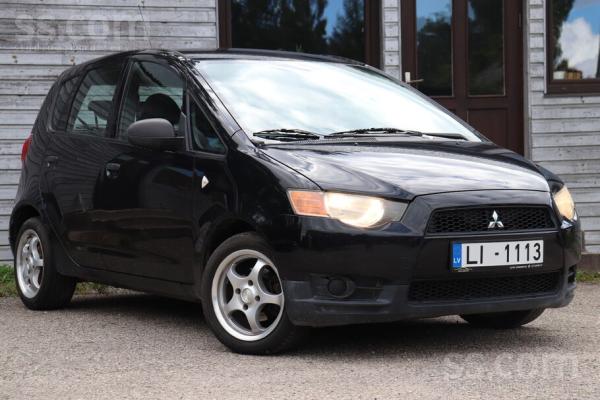Black Mitsubishi Colt 2009 in Valmiera, with an engine capacity of 1.30 L and mileage of 179 thousand km for 2500 €, photo 3 on AUTOMOTO.COM.LV