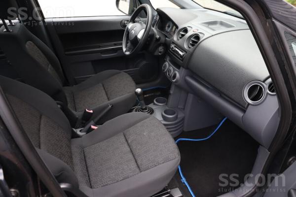 Black Mitsubishi Colt 2009 in Valmiera, with an engine capacity of 1.30 L and mileage of 179 thousand km for 2500 €, photo 6 on AUTOMOTO.COM.LV