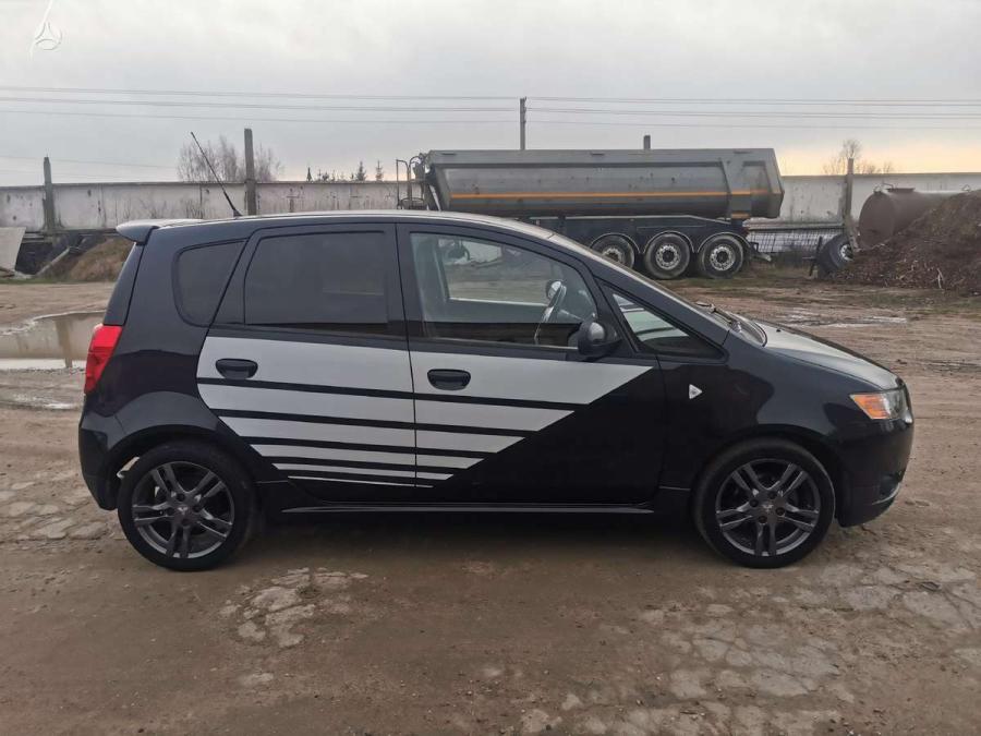 Black Mitsubishi Colt 2010 in Vilkaviskis, with an engine capacity of 1.33 L and mileage of 158 thousand km for 2100 €, photo 2 on AUTOMOTO.COM.LV