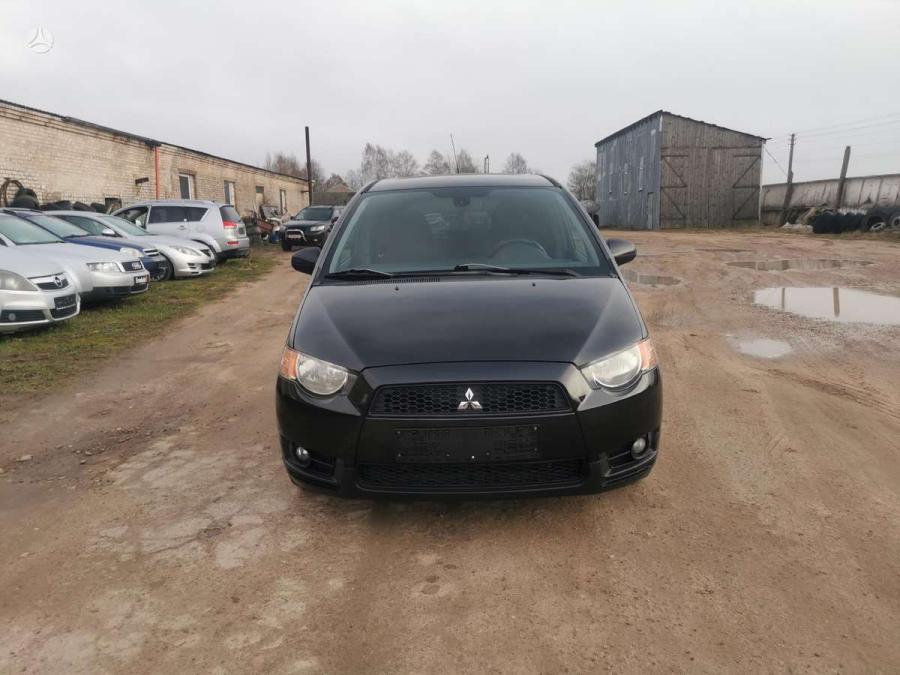 Black Mitsubishi Colt 2010 in Vilkaviskis, with an engine capacity of 1.33 L and mileage of 158 thousand km for 2100 €, photo 8 on AUTOMOTO.COM.LV