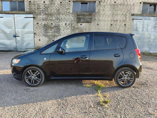 Black Mitsubishi Colt 2010 in Vilkaviskis, with an engine capacity of 1.33 L and mileage of 158 thousand km for 1700 €, photo 8 on AUTOMOTO.COM.LV
