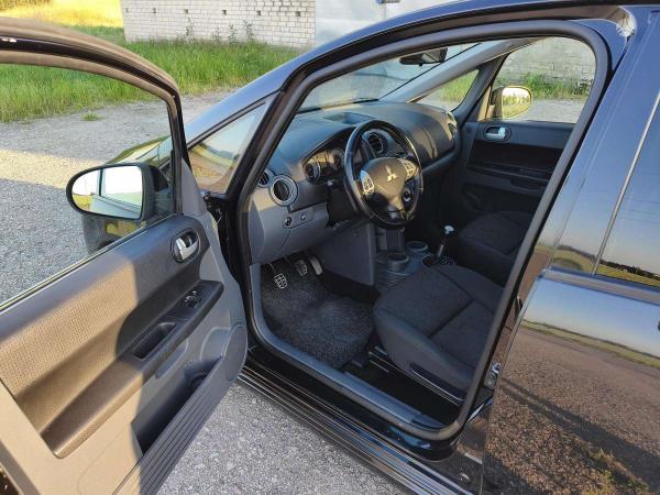 Black Mitsubishi Colt 2010 in Vilkaviskis, with an engine capacity of 1.33 L and mileage of 158 thousand km for 1700 €, photo 9 on AUTOMOTO.COM.LV