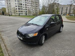 Black Mitsubishi Colt 2011 in Riga, with an engine capacity of 1.30 L and mileage of 136 thousand km for 2850 €, photo  on AUTOMOTO.COM.LV