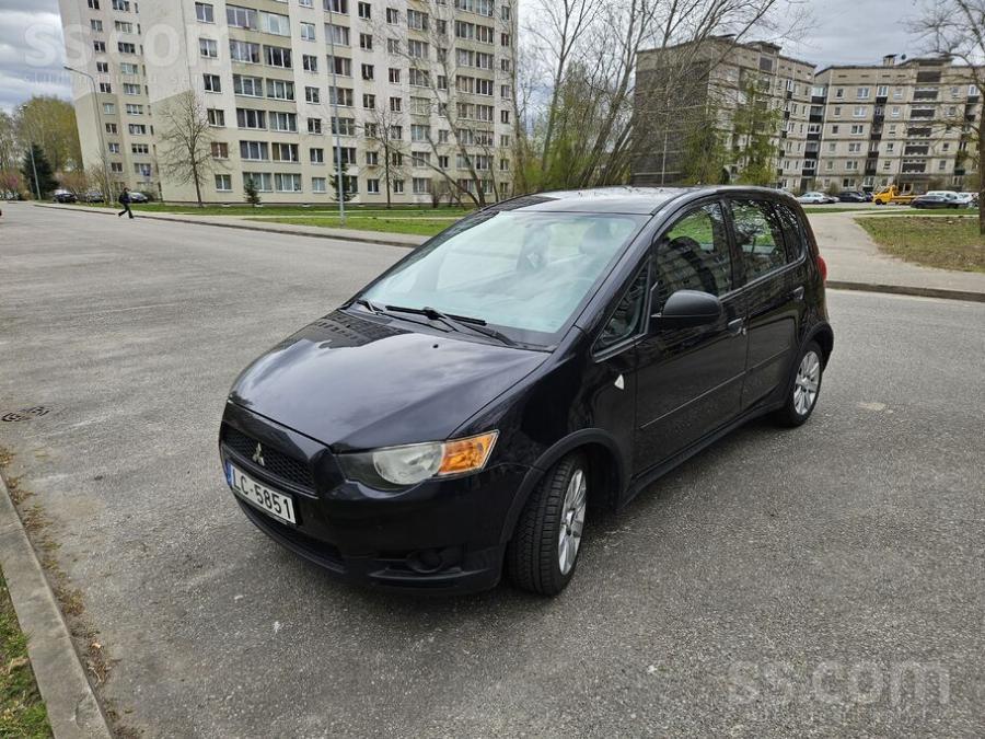 Black Mitsubishi Colt 2011 in Riga, with an engine capacity of 1.30 L and mileage of 136 thousand km for 2850 €, photo 1 on AUTOMOTO.COM.LV