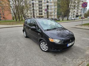 Black Mitsubishi Colt 2011 in Riga, with an engine capacity of 1.30 L and mileage of 136 thousand km for 2850 €, photo 3 on AUTOMOTO.COM.LV